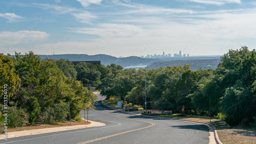 View of Road with Bike Lane with Downtown Austin Skyline in the ...