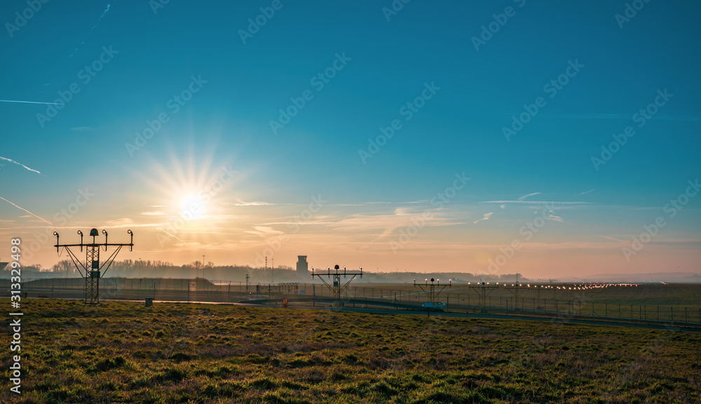 Airport infrastructure at sunny sunset. Runway end identification ...
