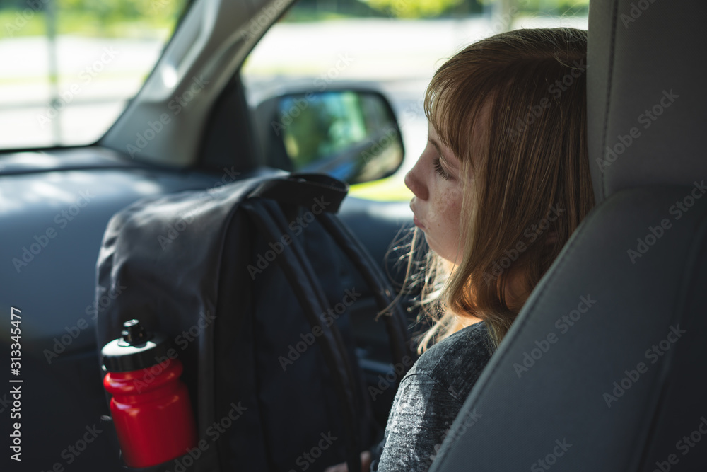 Sad/Depressed teen girl sitting in a car/suv while being driven to ...