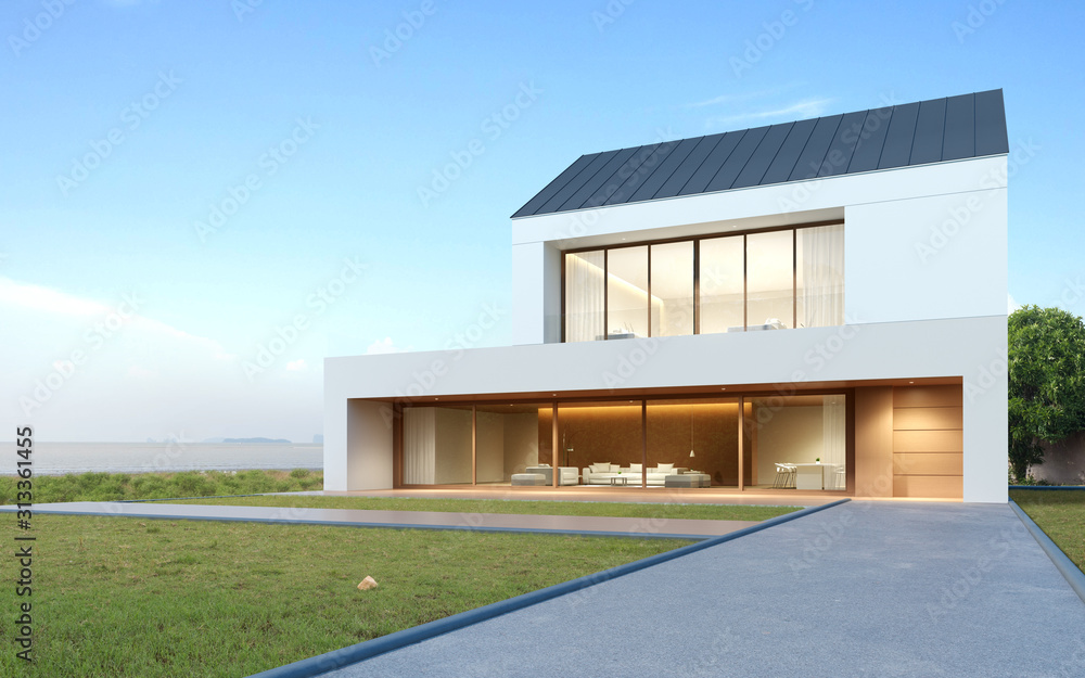Perspective of modern luxury building with wood terrace and grass field ...