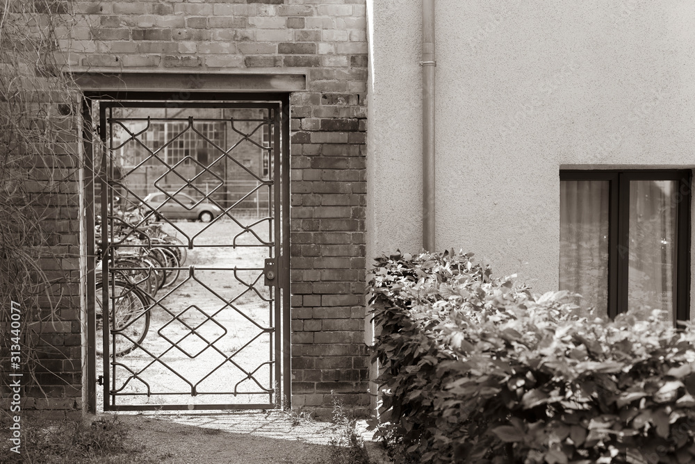 A small iron gate to a bicycle parking lot, Forged small iron gate ...