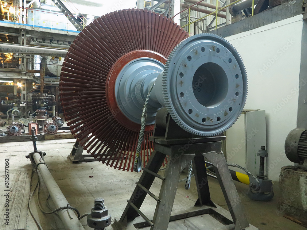 Power generator steam turbine in repair process, machinery, pipes ...