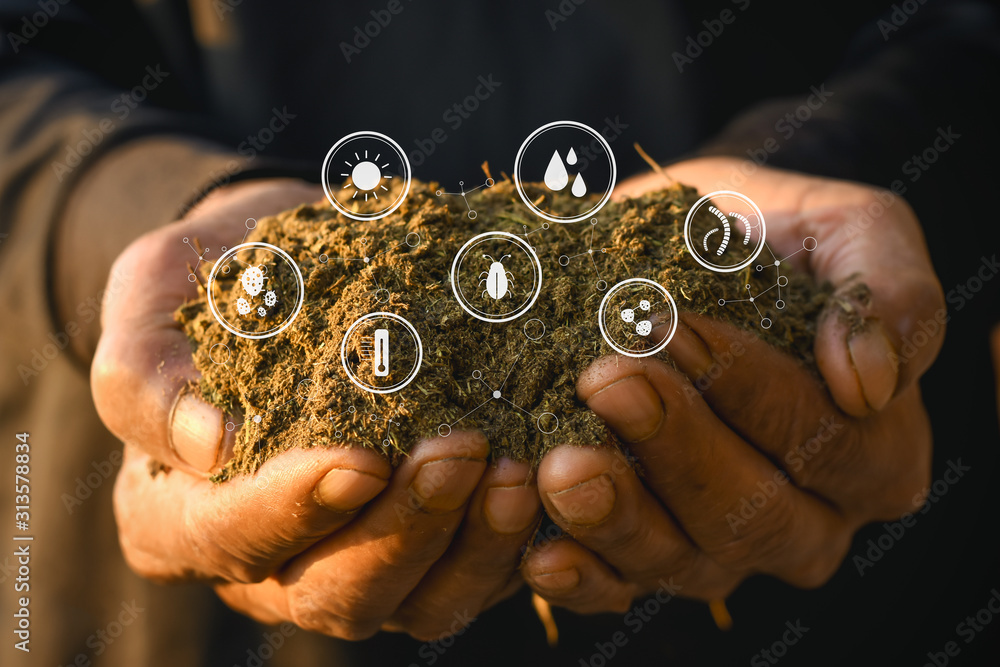 manure-or-dung-in-the-hands-of-a-farmer-man-and-technology-icons-about