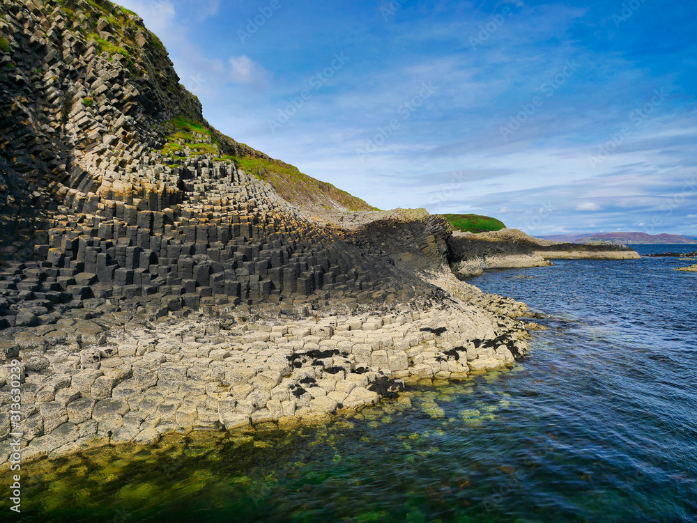 Columns of jointed volcanic basalt rocks in which the vertical joints ...