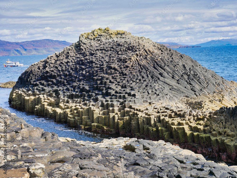 Columns of jointed volcanic basalt rocks in which the vertical joints ...