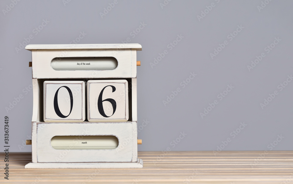 Desktop wooden retro calendar with day number 6. Calendar template for ...