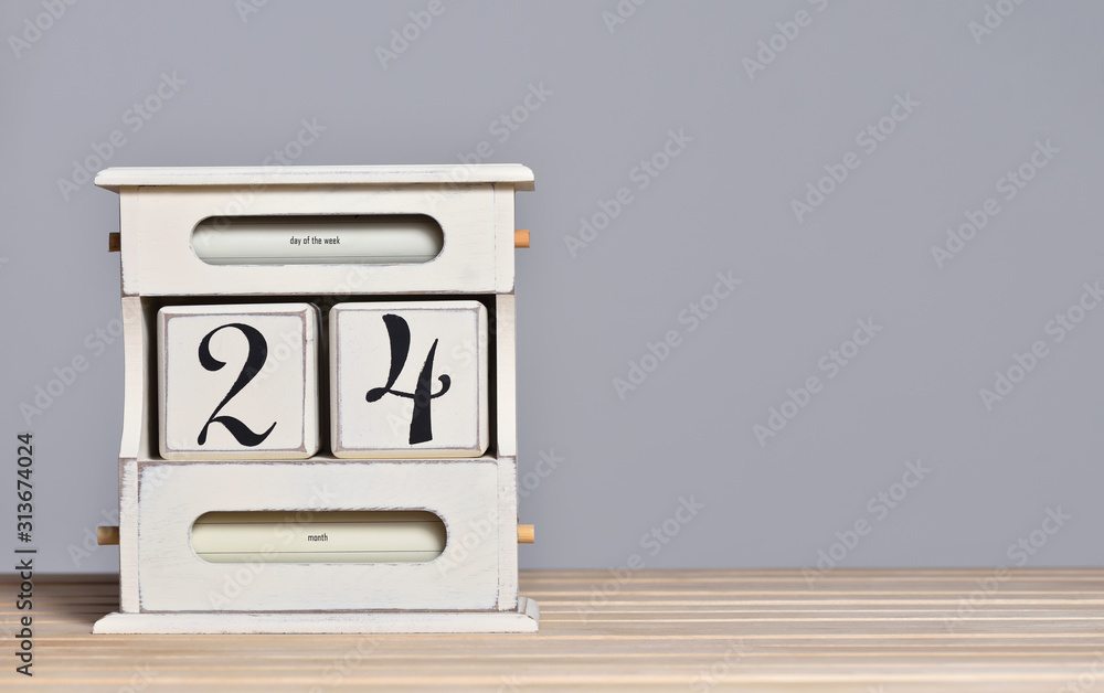 Desktop wooden retro calendar with day number 24. Calendar template for ...