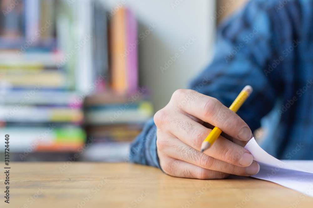 high school,university student study.hands holding pencil writing paper ...
