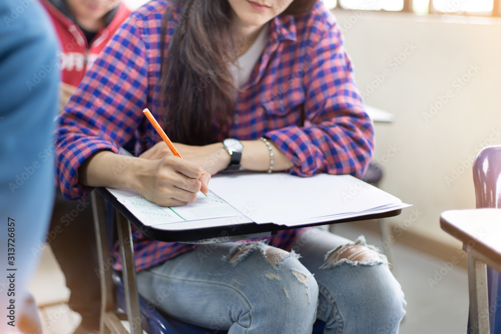 high school,university student study.hands holding pencil writing paper ...