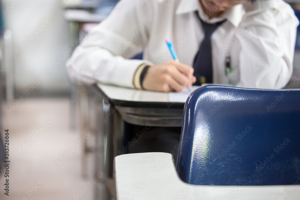 high school,university student study.hands holding pencil writing paper ...