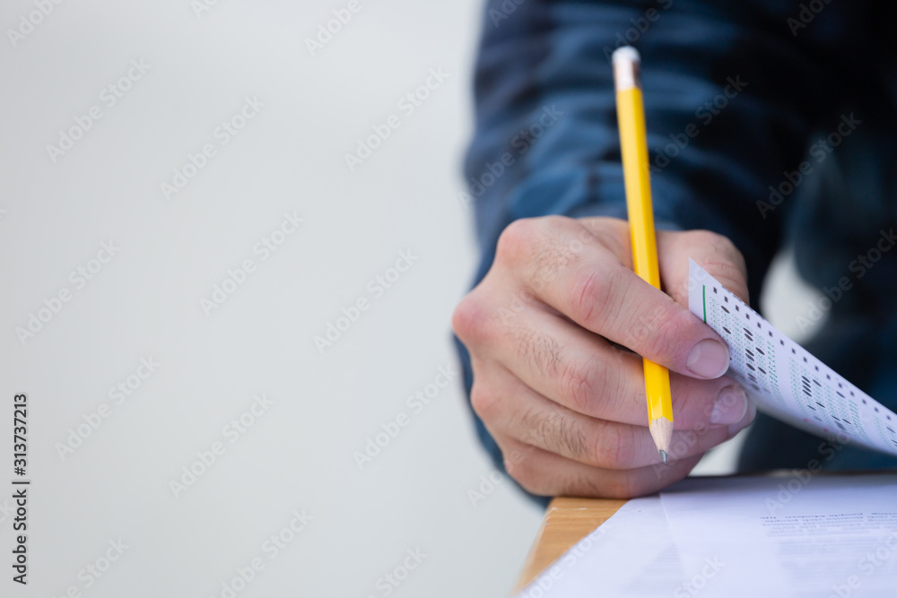 high school,university student study.hands holding pencil writing paper ...