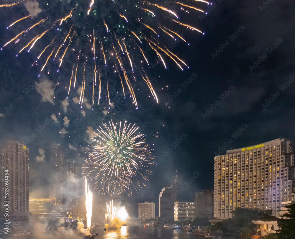 Celebration of New year day with colorful fireworks on Chao Phraya ...