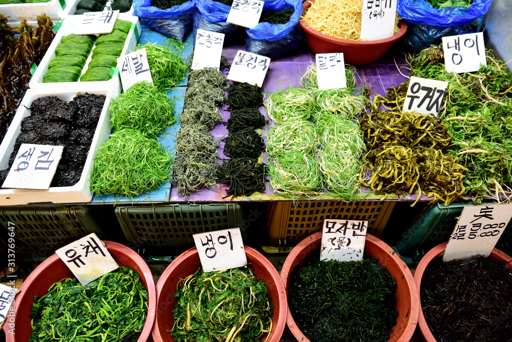 Various freshly harvested raw seaweed sea plants in a fresh seafood ...