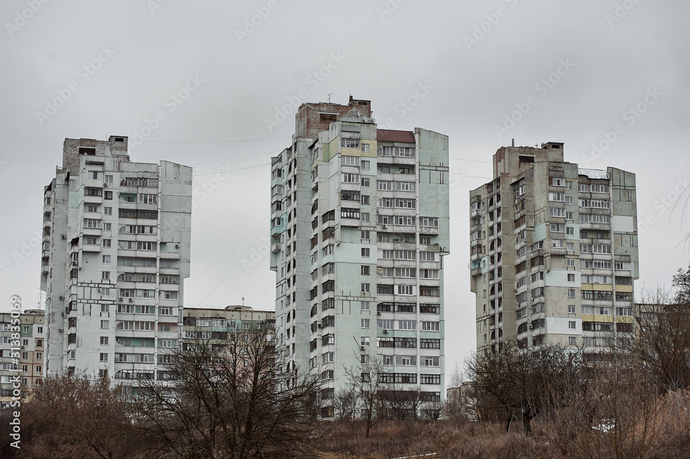 abandoned high-rise building of the Soviet Union in the winter in the ...