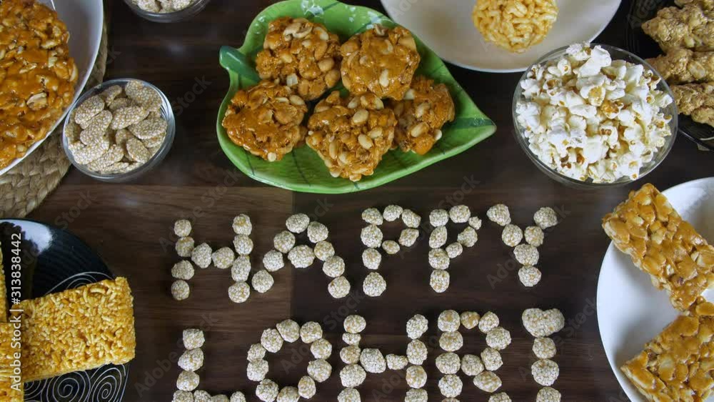 Vídeo do Stock: Zoom out shot of 'Happy Lohri' text written with rewri ...