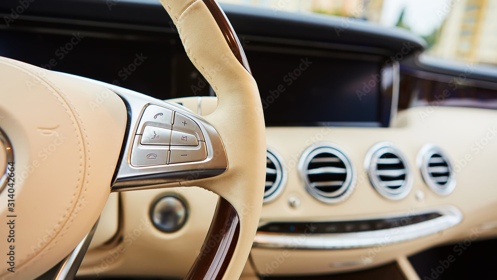 Control buttons on the steering wheel of a car Stock Photo | Adobe Stock