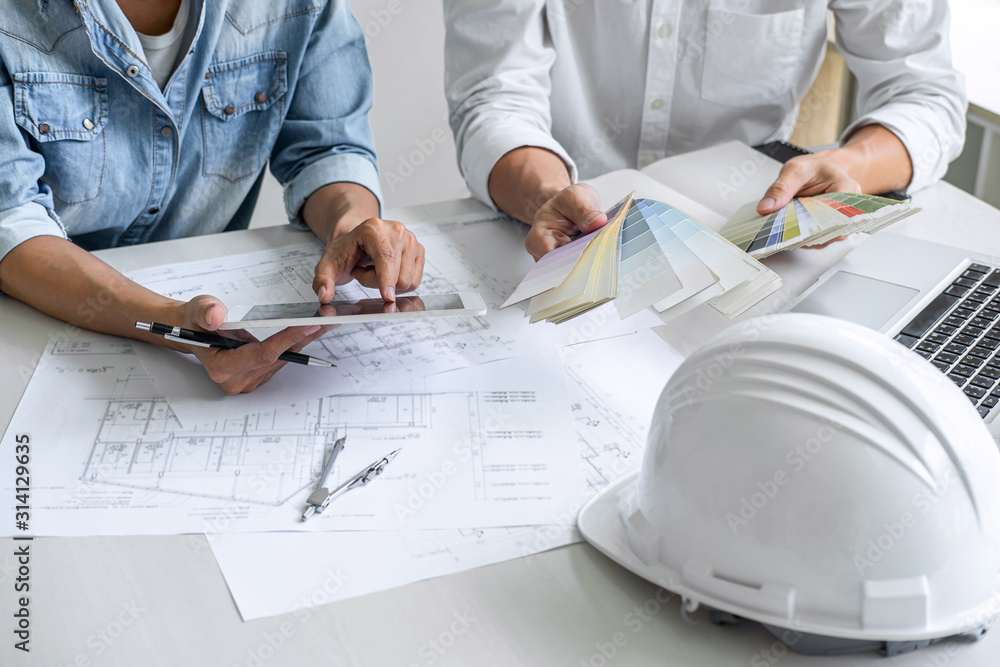 Architecture Engineer Teamwork Meeting, Drawing and working for ...