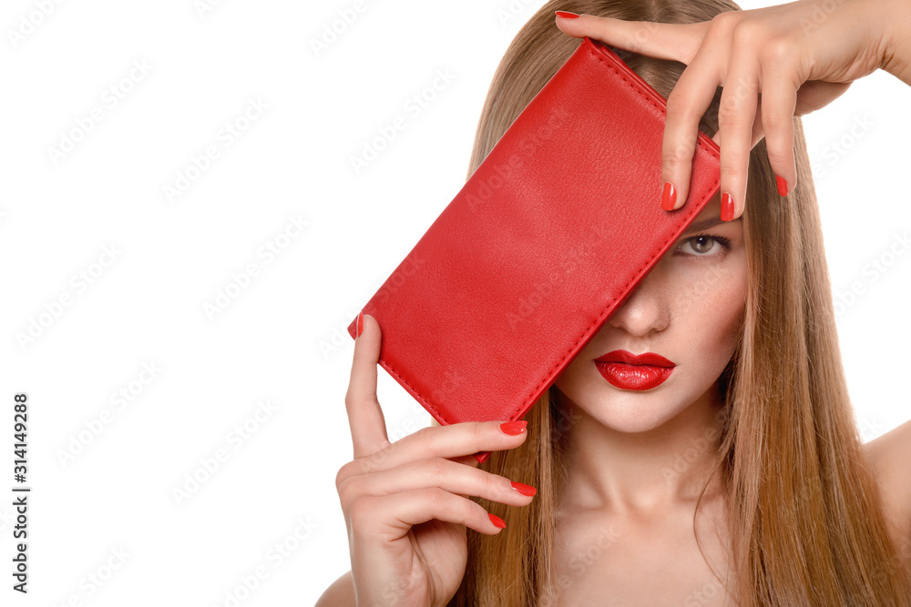 Young Blonde Woman With Long Hair Red Lips And Red Nails Which Holds