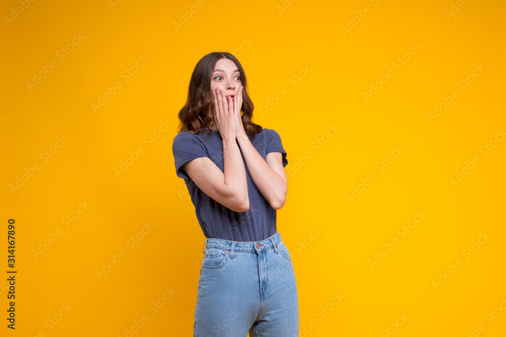 Portrait surprised young caucasian brunette woman with long hair in ...