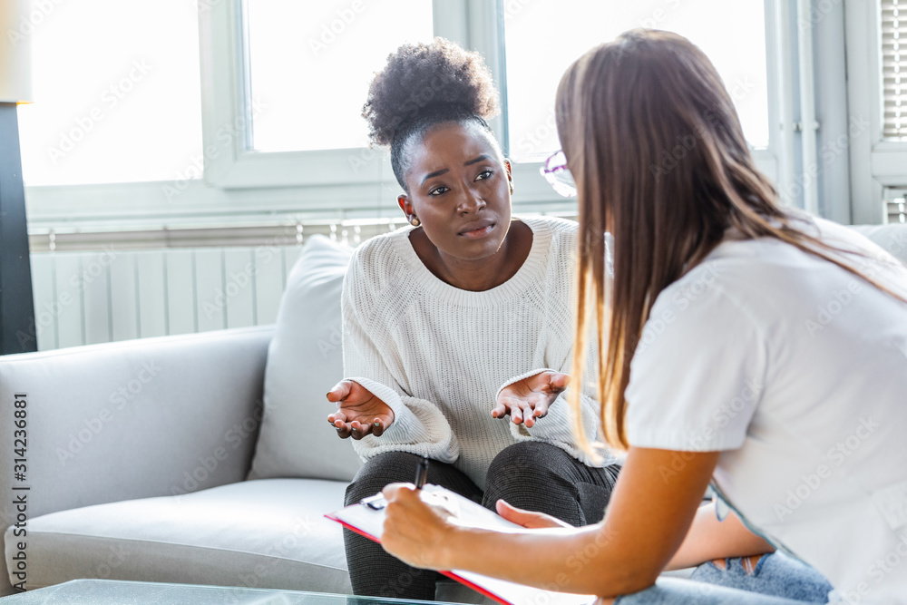 Patient receiving bad news, She is desperate and crying, Doctor support ...