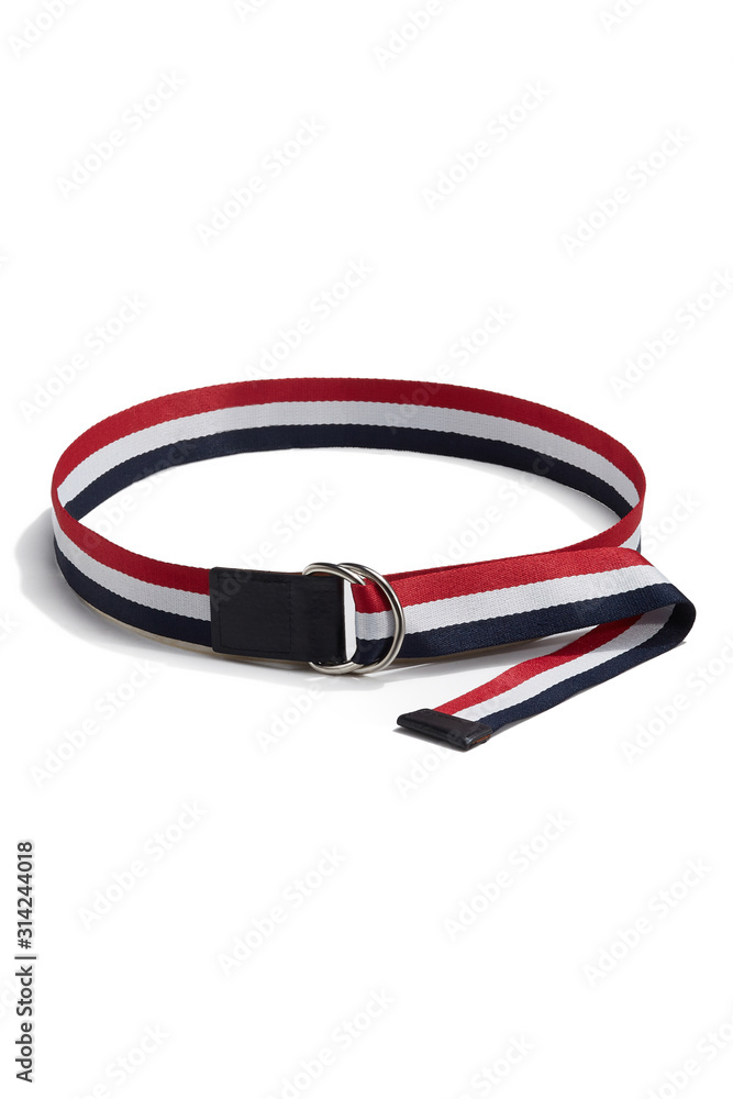 Subject shot of a striped red, white and blue canvas belt with black ...