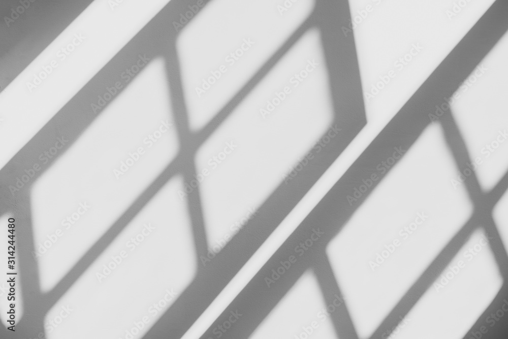 abstract shadow of the window in morning light on white wall texture ...