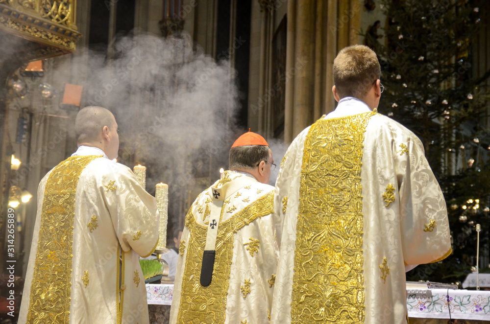 Catholic priests perform the Midnight Mass in Cathedral. Christmas Eve ...