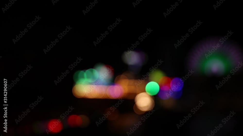Colorful blurry blinking lights of a carnival at night Stock Video ...
