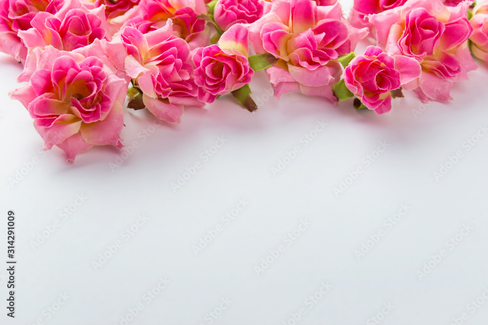 Simple decorative background with pink roses on the top of image and ...
