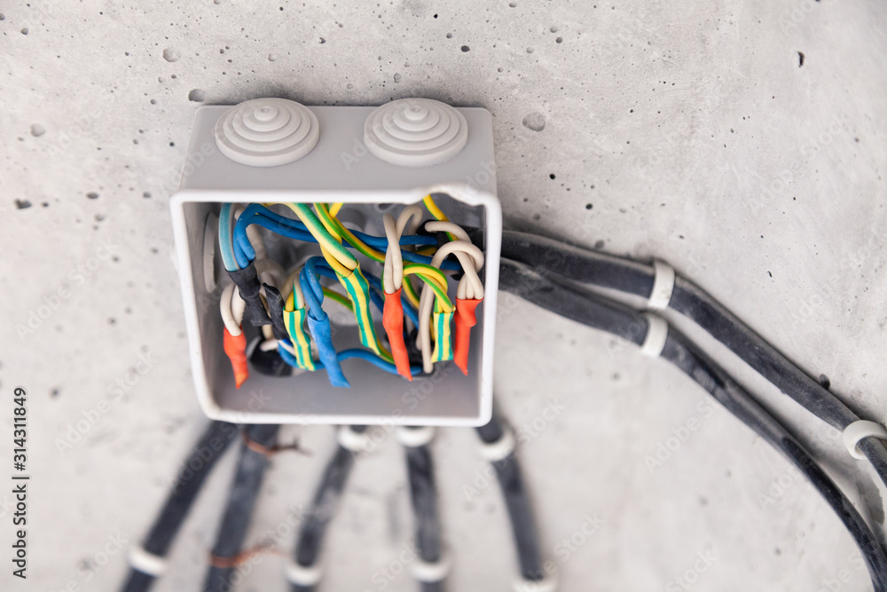 Cable laying ceiling. Electrical wires on wall. Wiring replacement ...