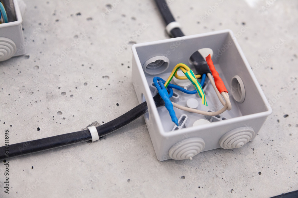 Cable laying ceiling. Electrical wires on wall. Wiring replacement ...