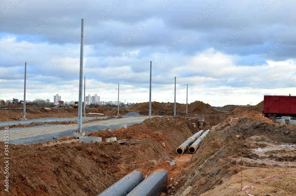Laying underground storm sewers at a construction site. Groundwater ...