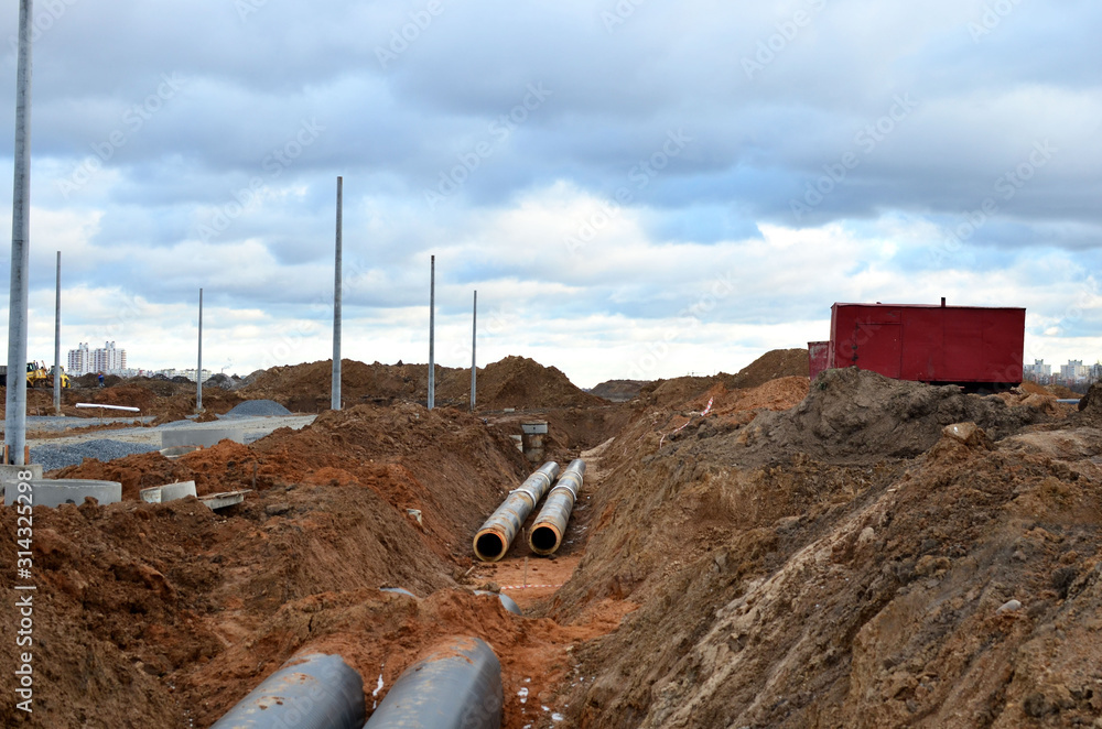 Laying underground storm sewers at a construction site. Groundwater ...