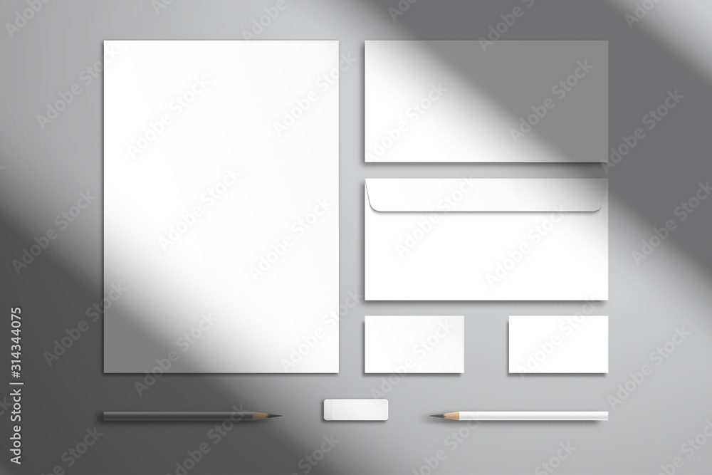 Flat layout with branding kit. White sheet of paper, two envelopes, two ...