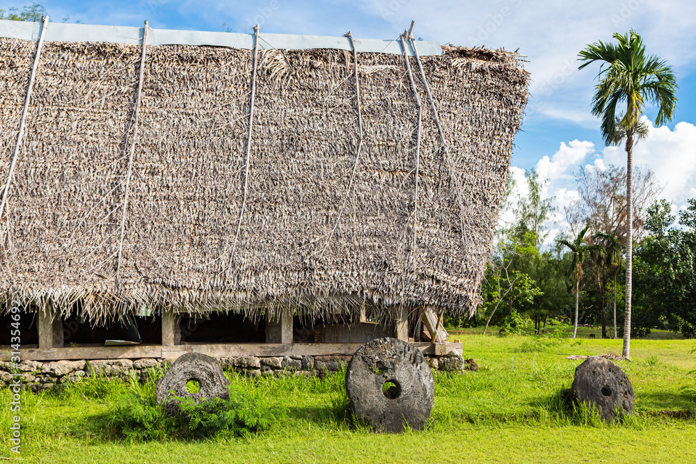 Traditional thatched yapese men's meeting house called faluw or fale ...