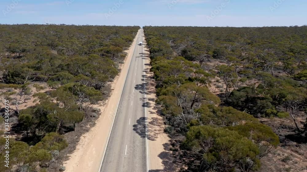 Smooth 4K drone footage of of the long straight road that is the Eyre ...