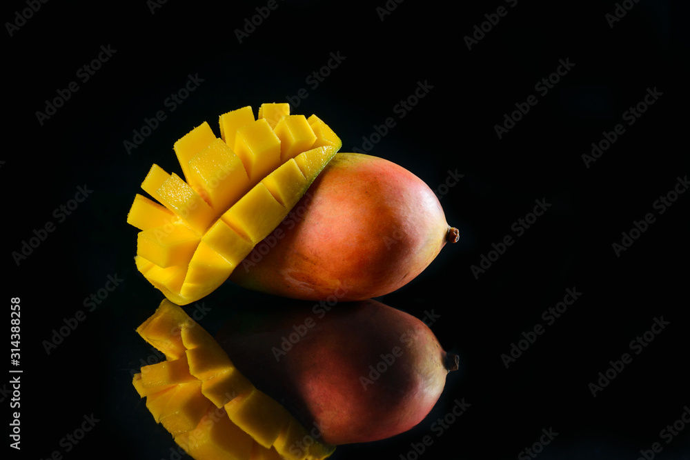 Fragrant mango on glass Stock Photo | Adobe Stock