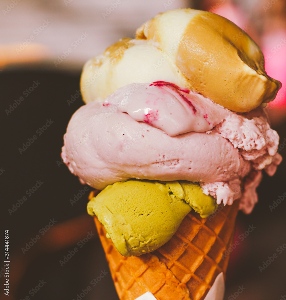 Ice cream cone melting outdoors in summer, sweet dessert food on ...