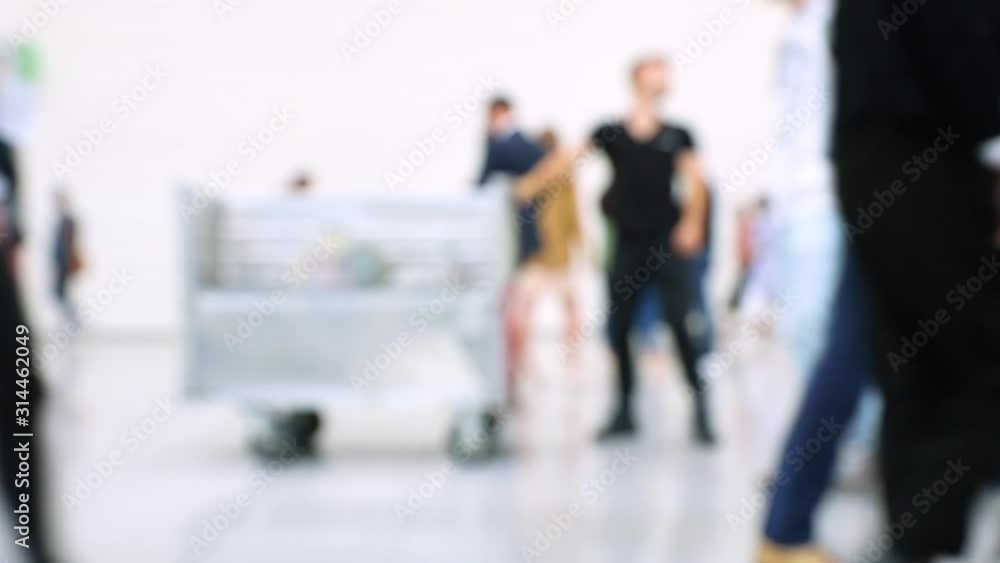 Blurred crowd of people passing by in a hallway at conference Stock ...