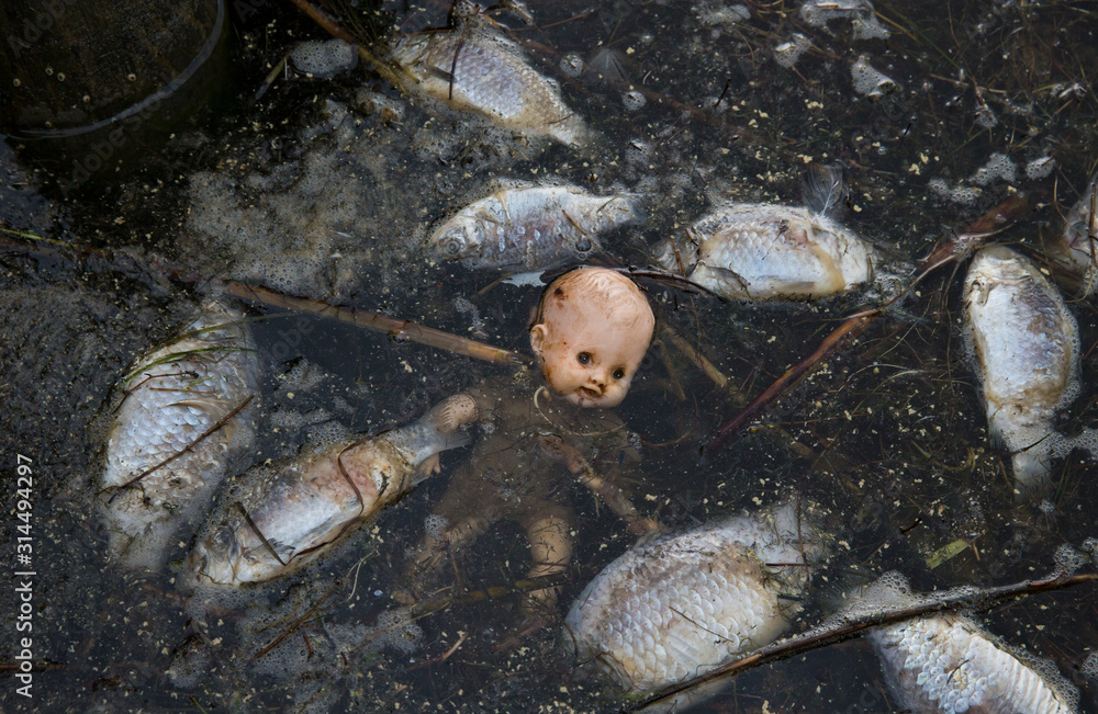 Symbolic image of the abandoned baby doll floating in the middle of ...