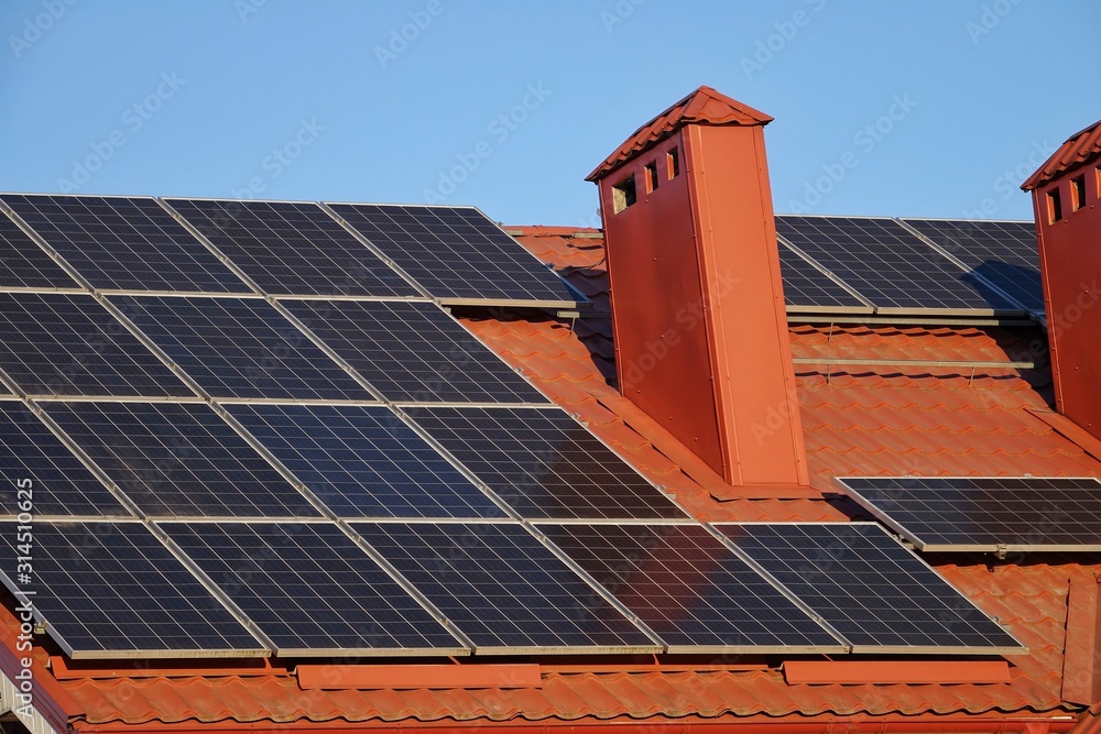 Roof of a house with solar panels, alternative energy sources Stock ...