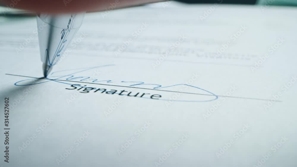 Person Signing Important Document. Camera Following Tip of Pen as it ...