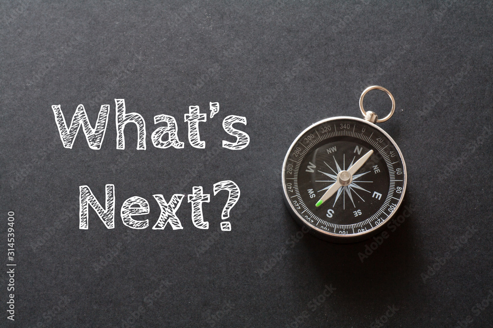 Written What's Next words on black background with compass Stock Photo ...