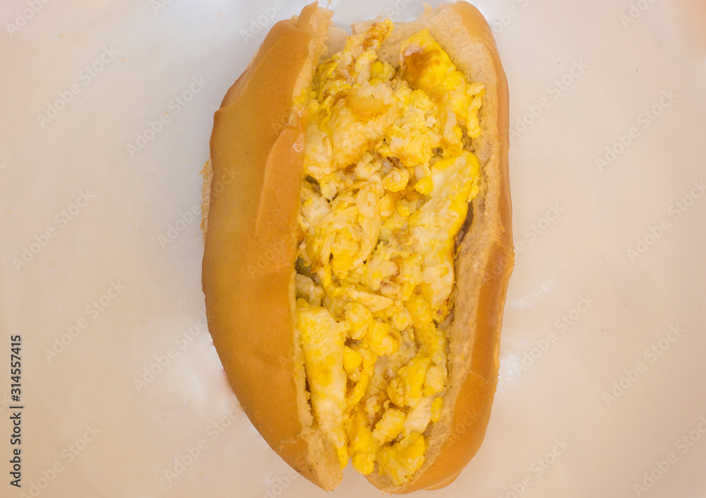 Bread with scrambled egg. Brazilian snack knows as "Pão com ovo" Stock ...