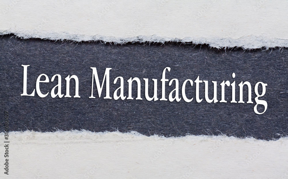 Lean Manufacturing words under torn black paper. Stock Photo | Adobe Stock