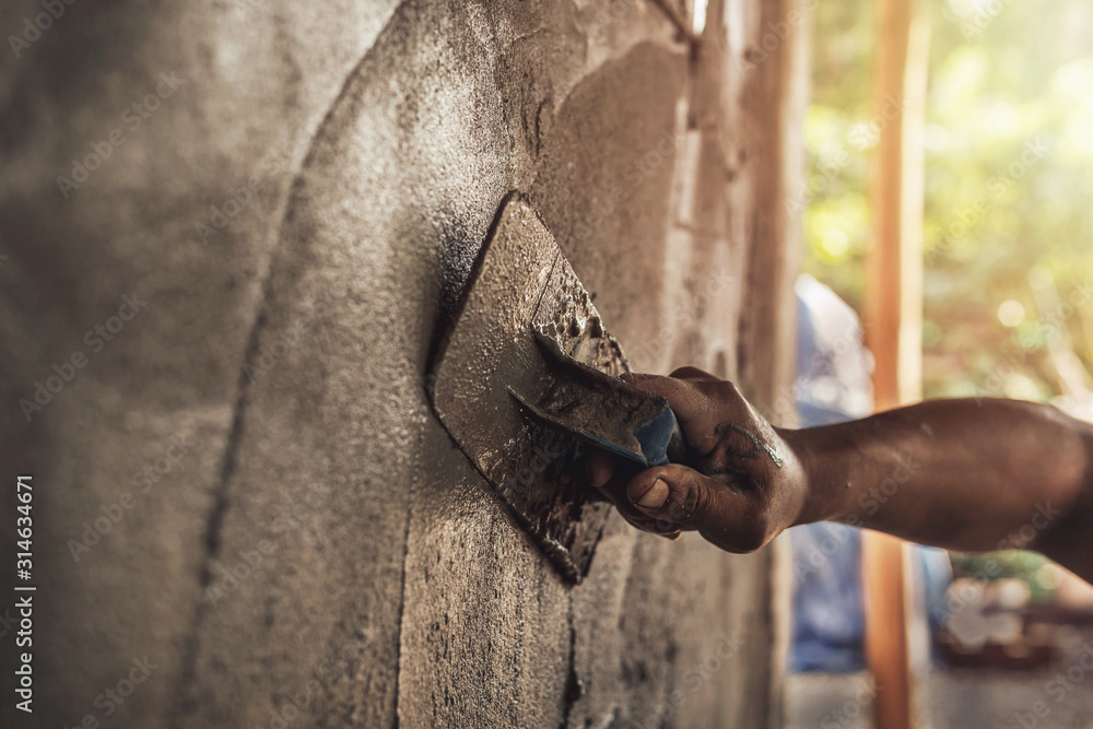mason rural thailand Plastering concrete to build wall background ...