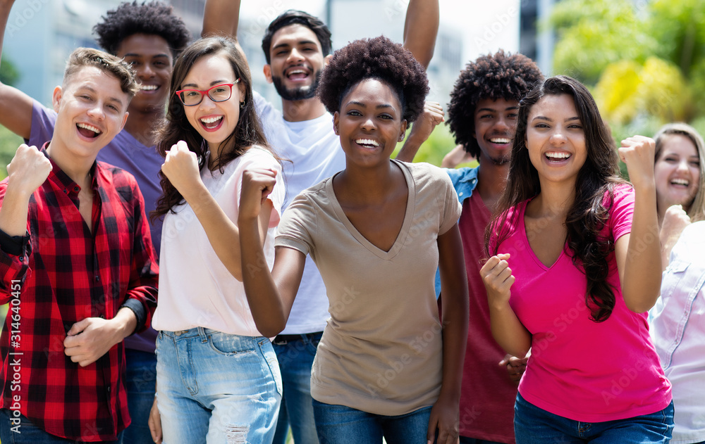 Group of cheering african american and caucasian and hispanic and latin ...