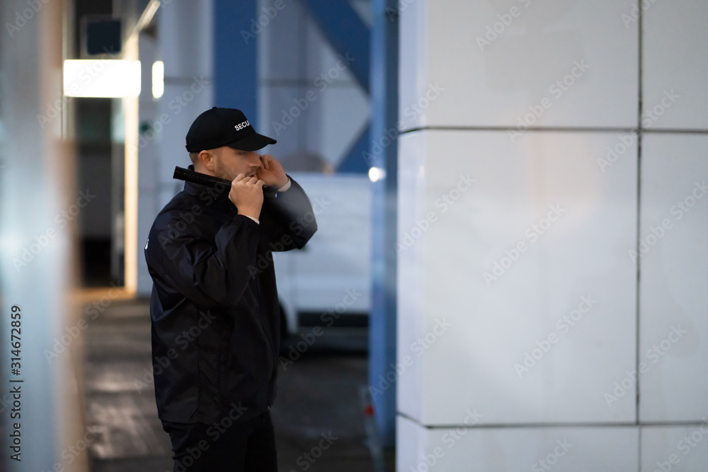 Security Guard Walking Building Perimeter Stock Photo | Adobe Stock
