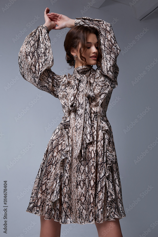 Sexy beauty woman pretty face tan skin wear animal print silk dress ...