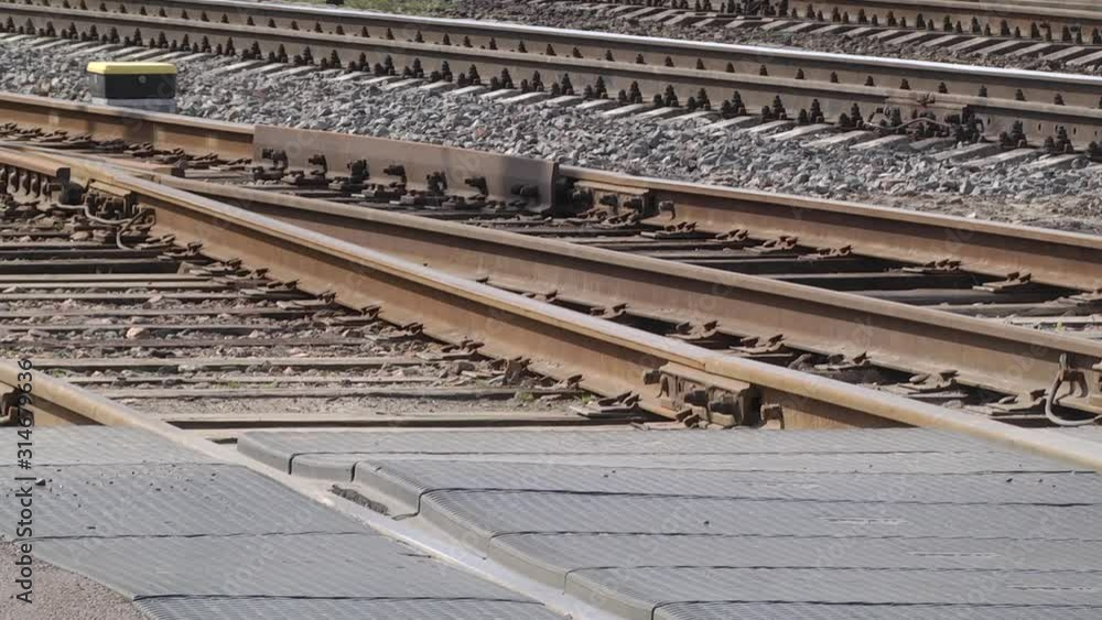 Double level Railway crossing over a tar road in an industrial area in ...
